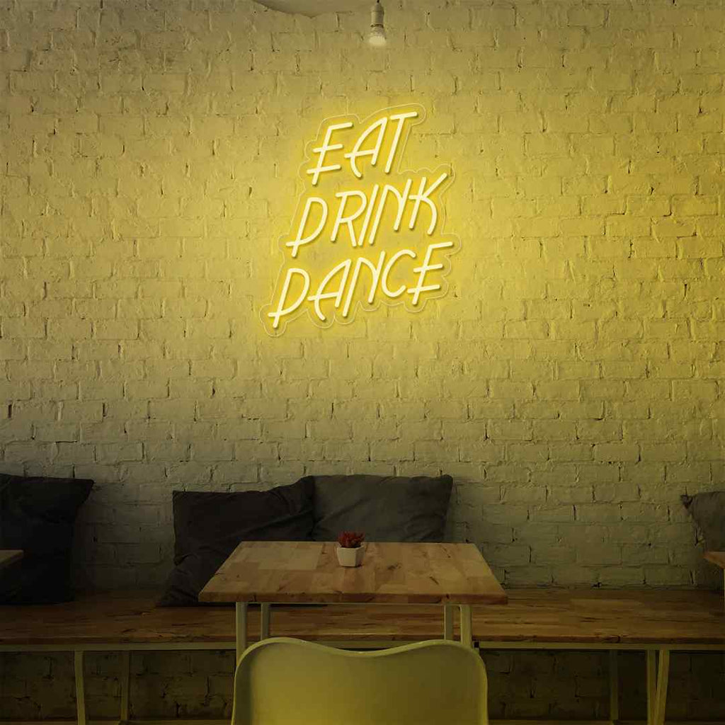 Eat drink dance neon sign